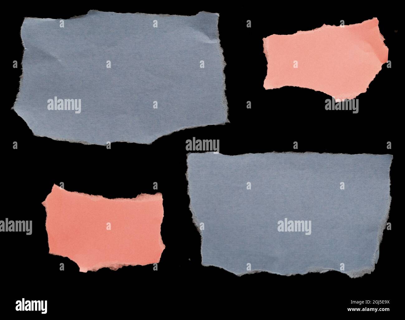 Color torn paper on black background Stock Photo - Alamy