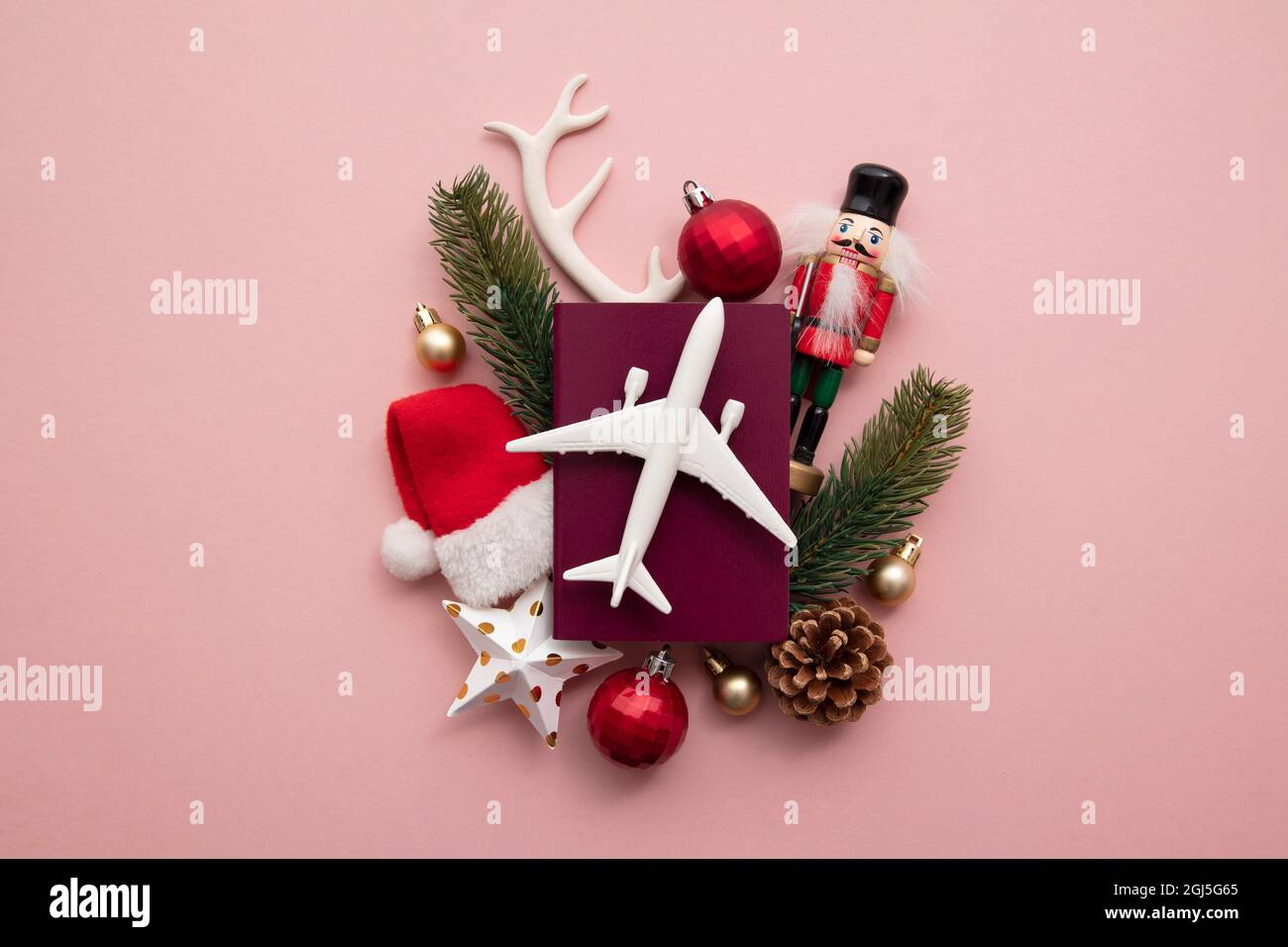 Festive christmas travel background. Airplane with passport and ...