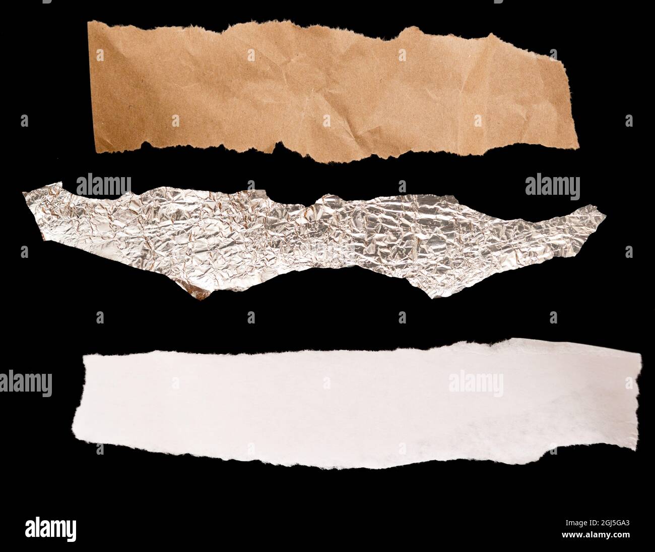 Torn paper and foil on black background Stock Photo - Alamy