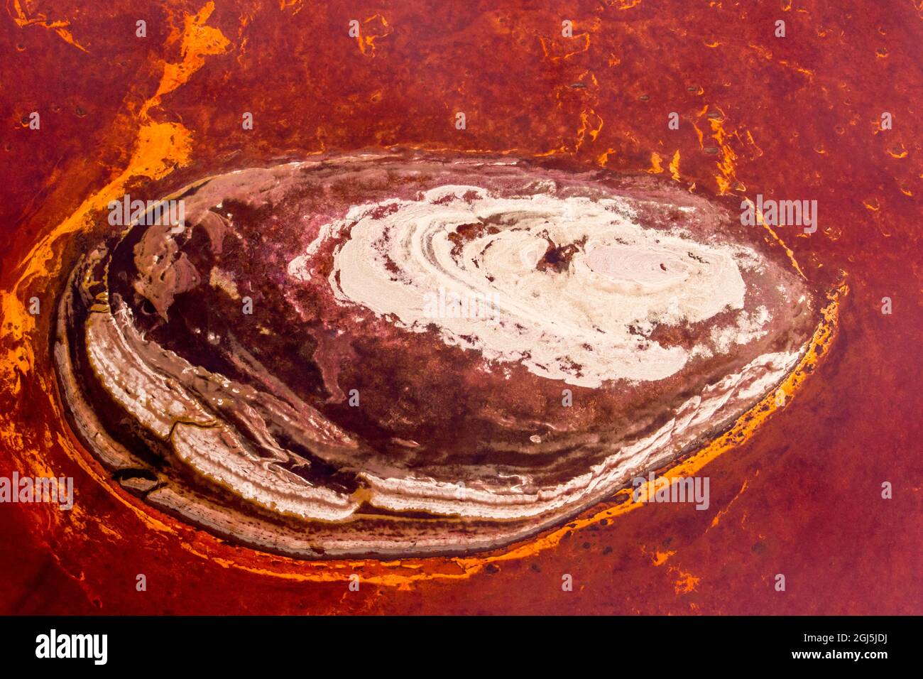 Africa, Tanzania, Aerial view of patterns of red algae and salt ...