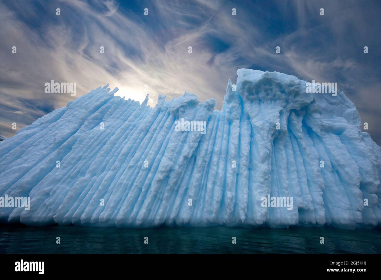Antarctica. Iceberg with ridge patterns in ocean Stock Photo - Alamy