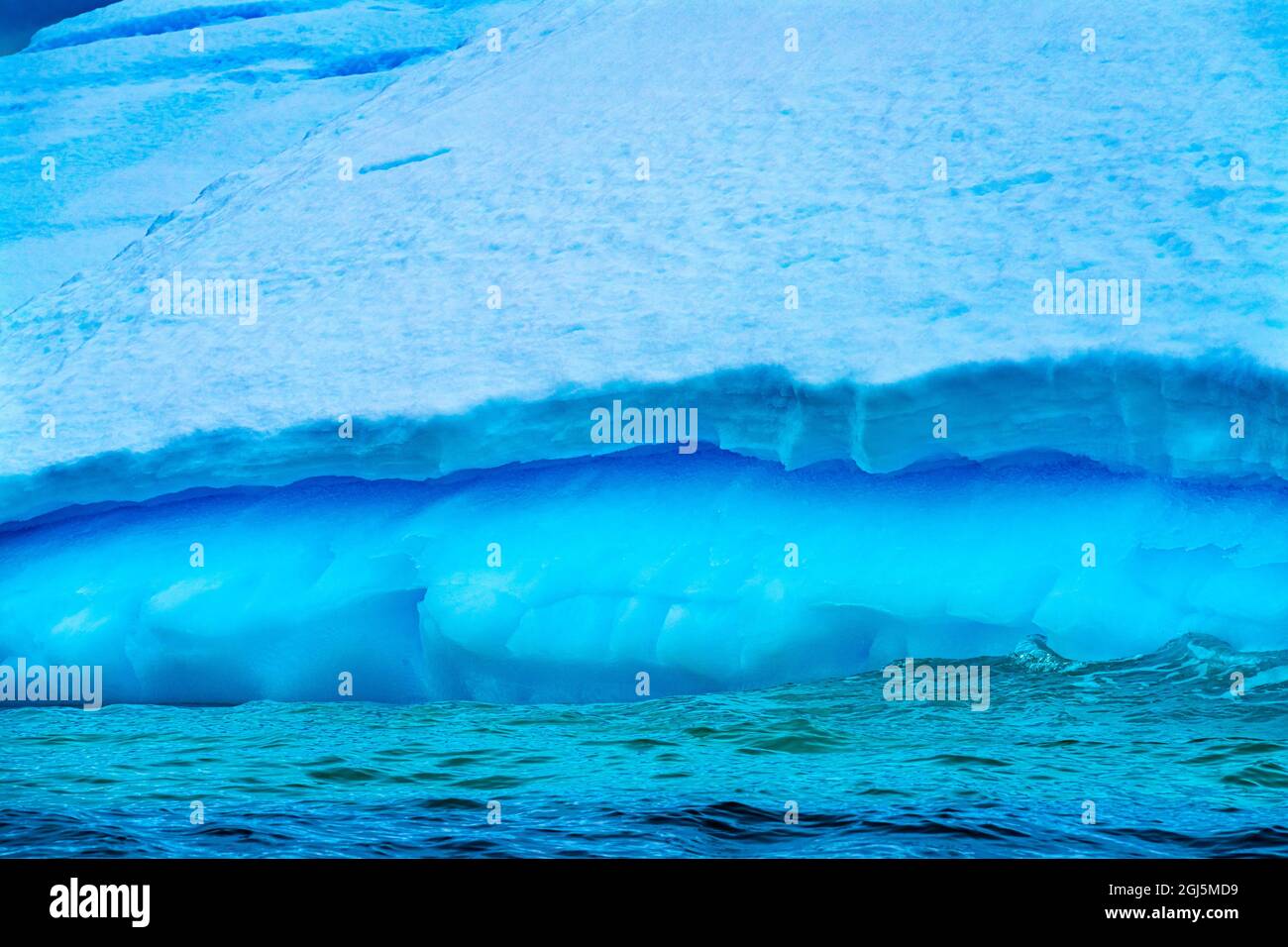 Floating blue iceberg Floating sea water Charlotte Bay, Antarctica ...