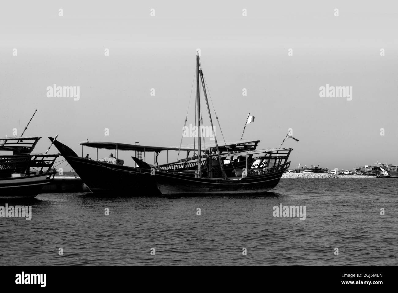 Traditional Arabic dhow - boats in Doha Cornish - QATAR Stock Photo - Alamy