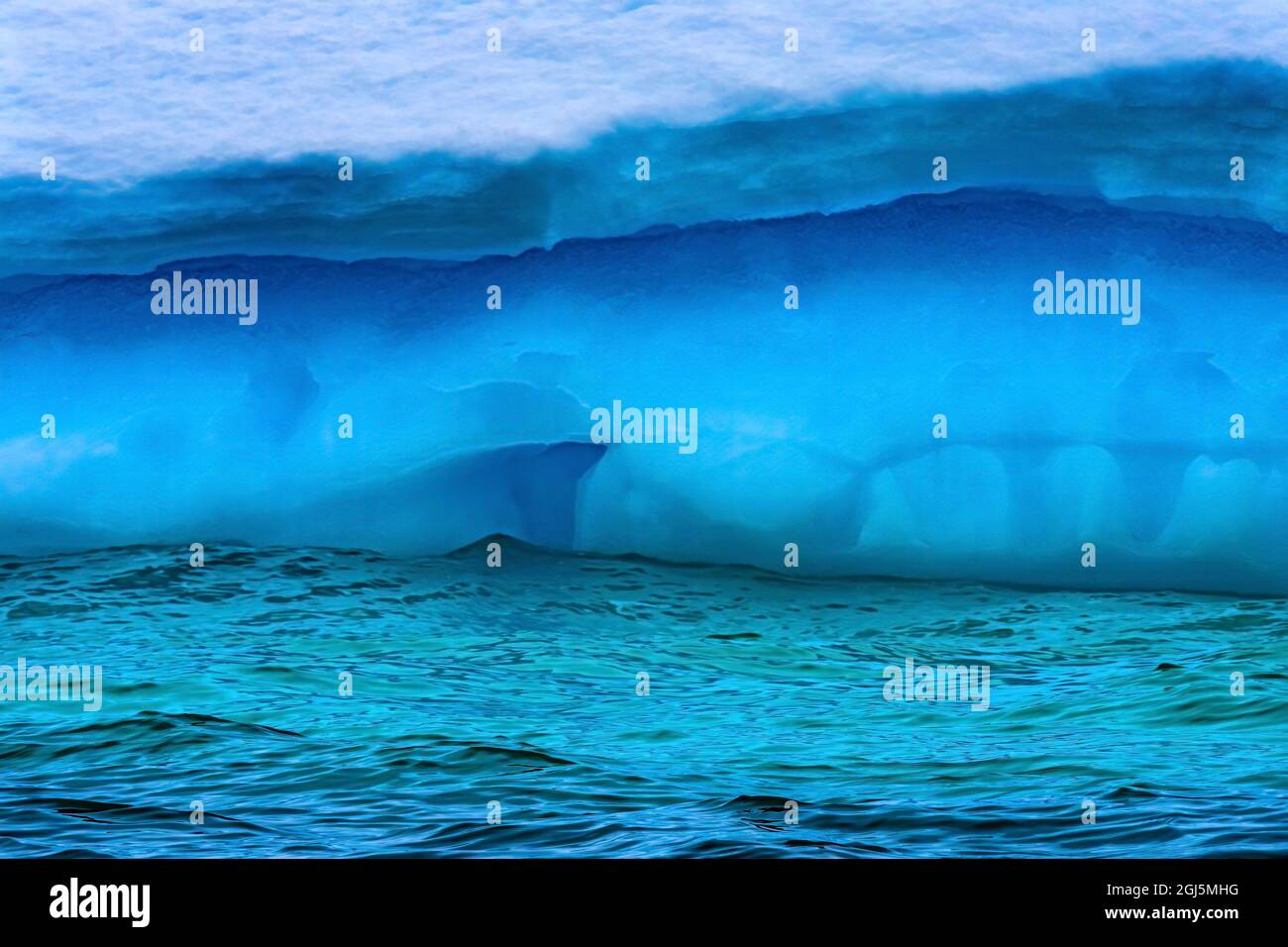 Floating blue iceberg Floating sea water Charlotte Bay, Antarctica ...