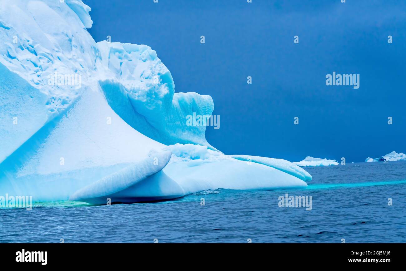 Floating blue iceberg Floating sea water Charlotte Bay, Antarctica ...