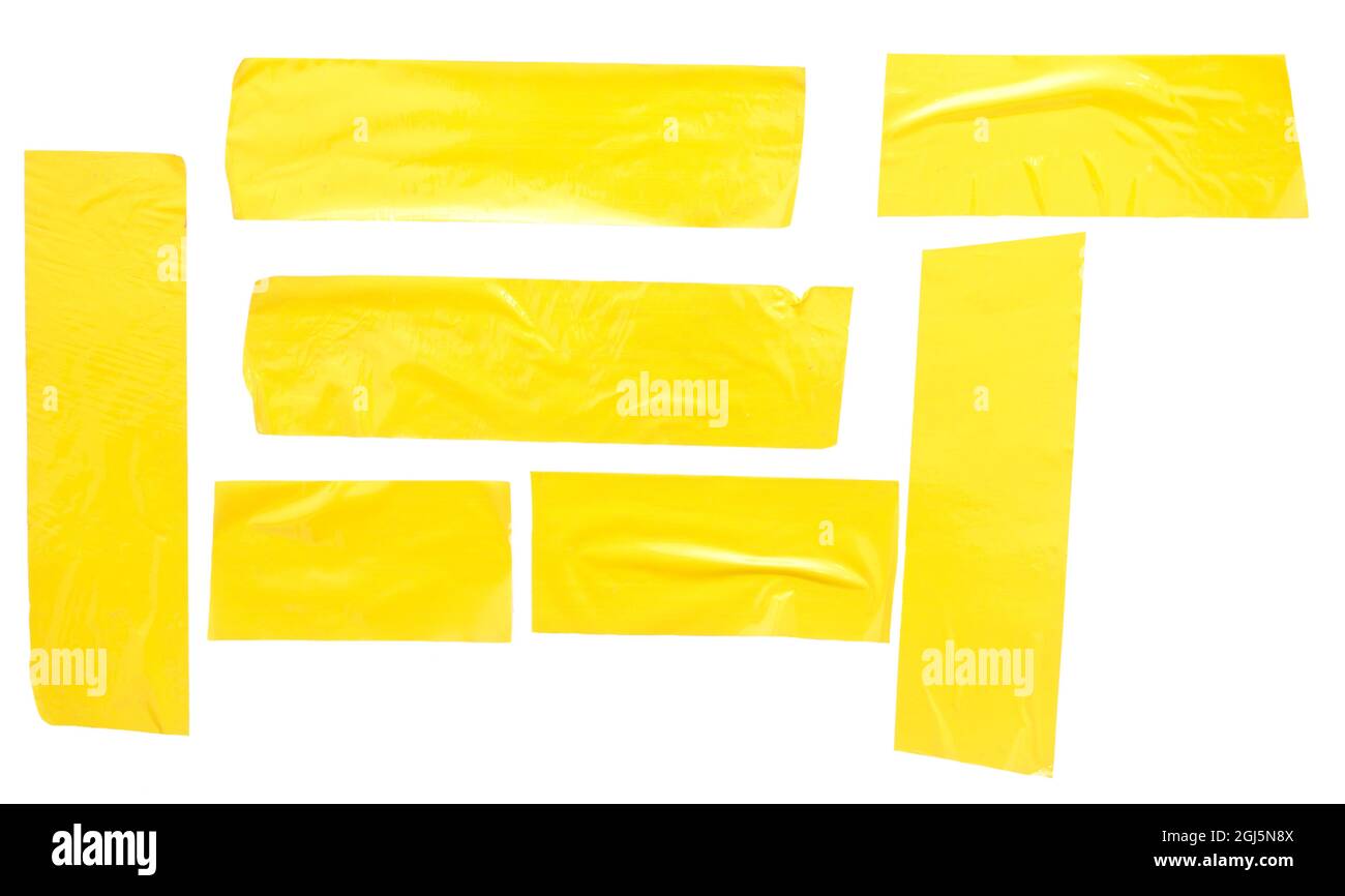 Yellow tapes isolated on white background Stock Photo - Alamy