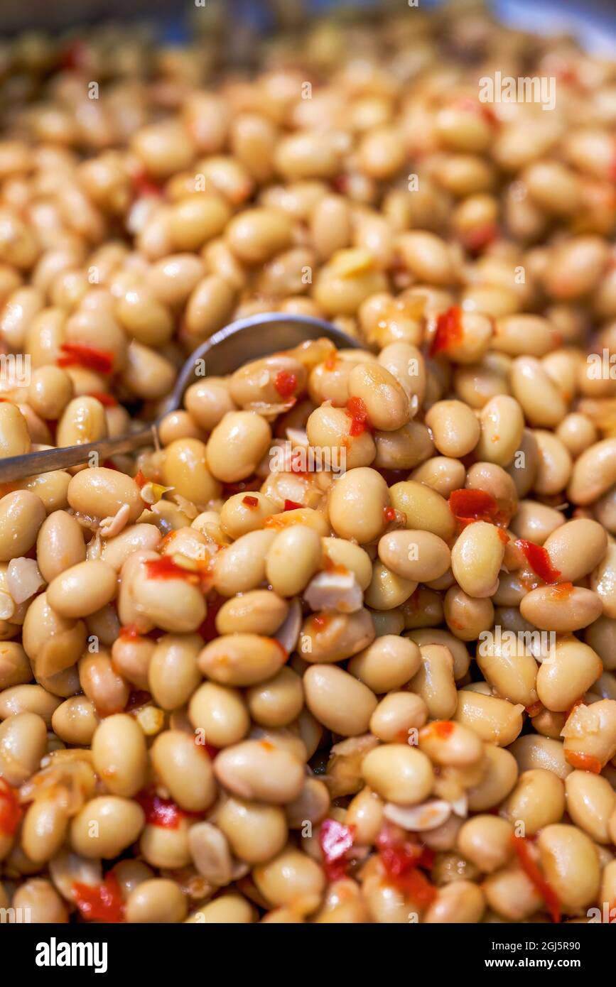 A delicious cold dish, braised soybeans with chili Stock Photo - Alamy