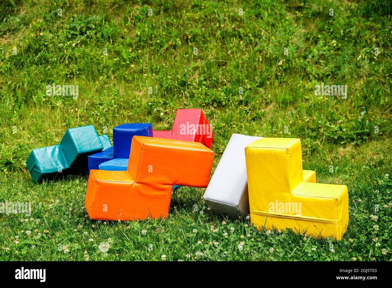 Soft colorful huge tetris puzzle. Outdoor games Stock Photo - Alamy