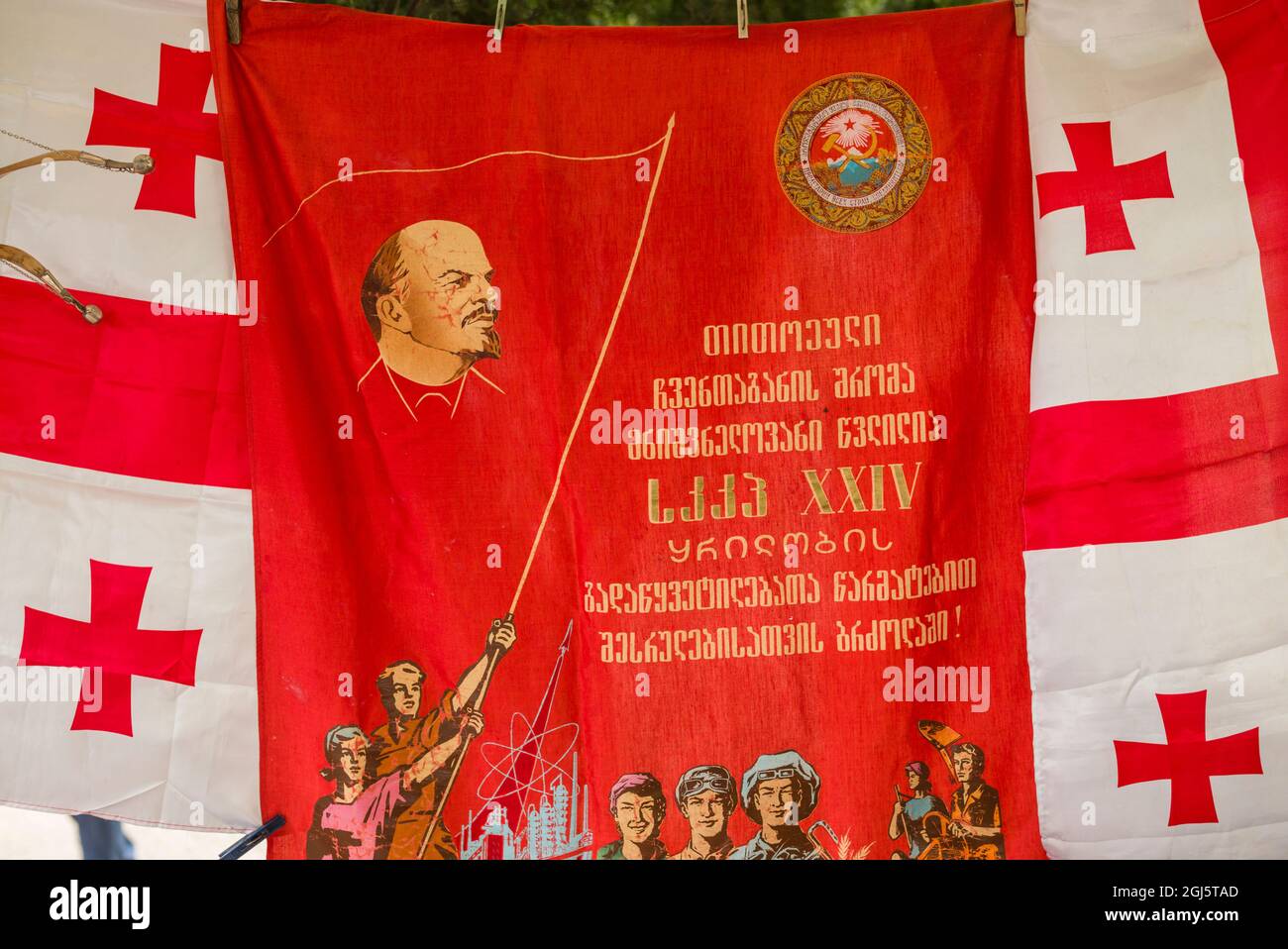 Georgia, Tbilisi. Dry Bridge Market, souvenir market, Lenin flag Stock ...