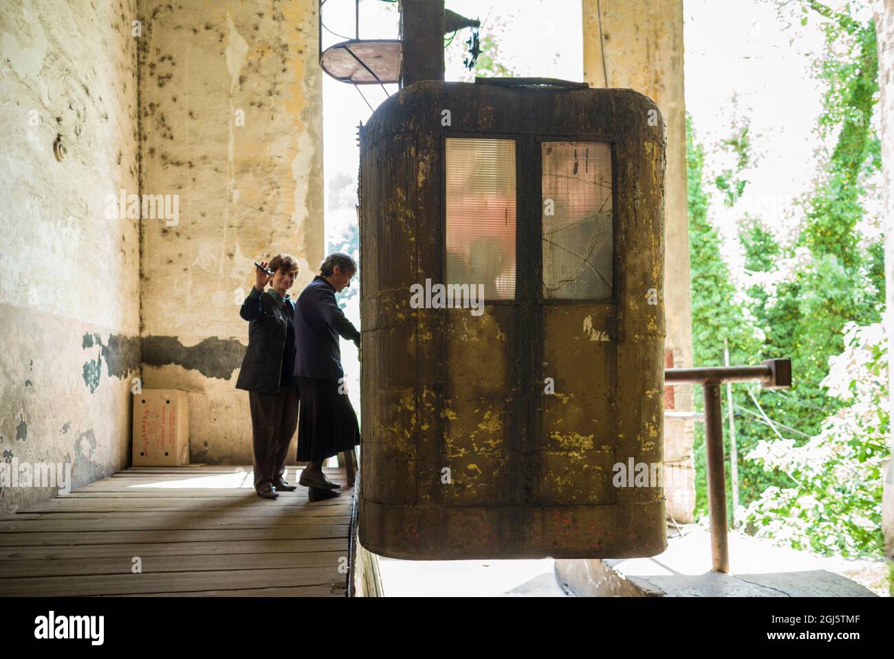 Georgia, Chiatura. Mining town cable cars and passengers Stock Photo ...