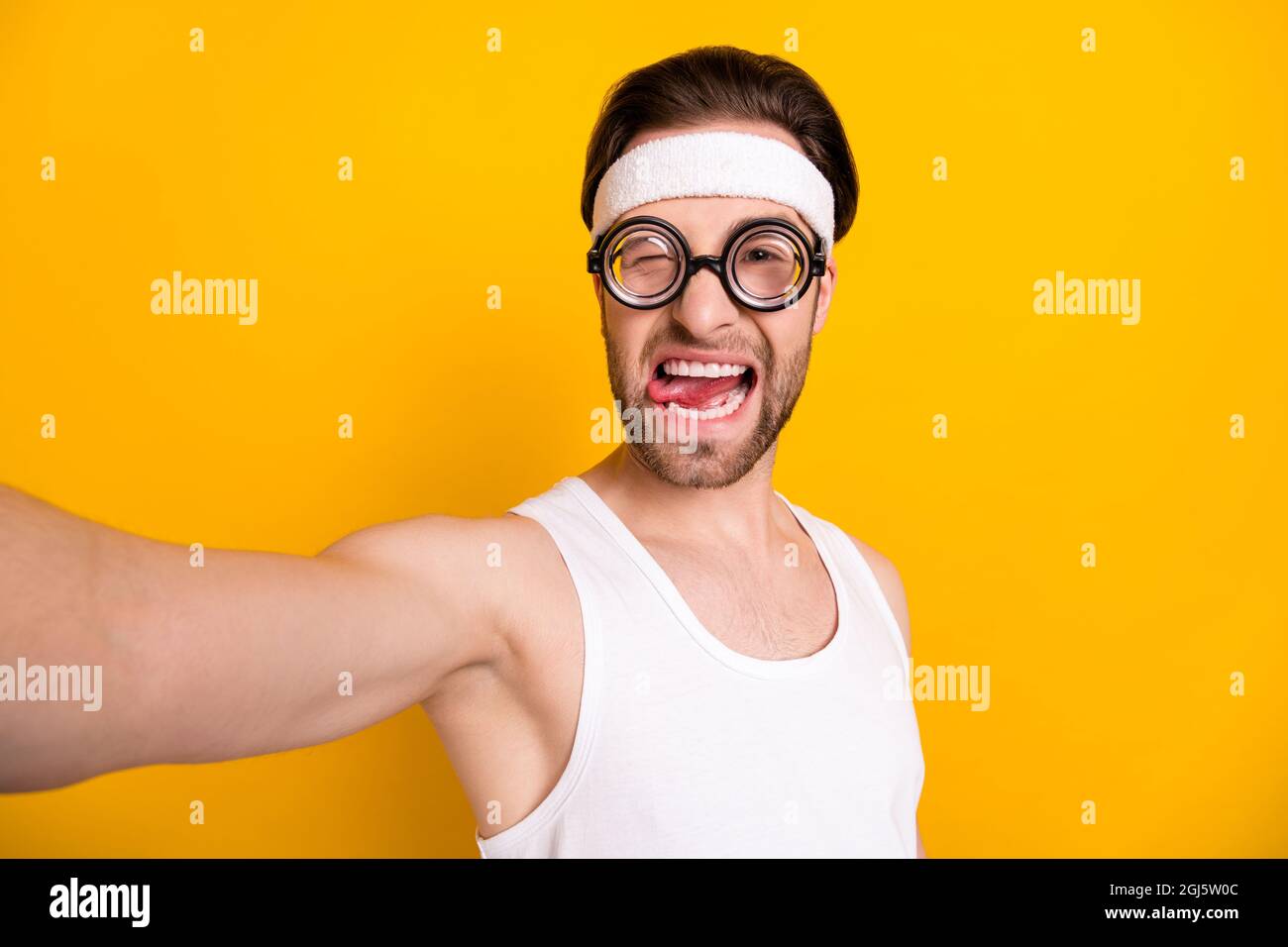 Self-portrait of attractive cheerful funny guy nerd sportsman grimacing ...