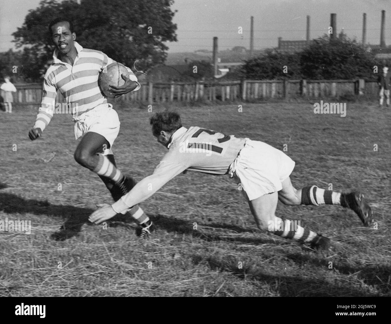 Rugby tackle Black and White Stock Photos & Images - Alamy