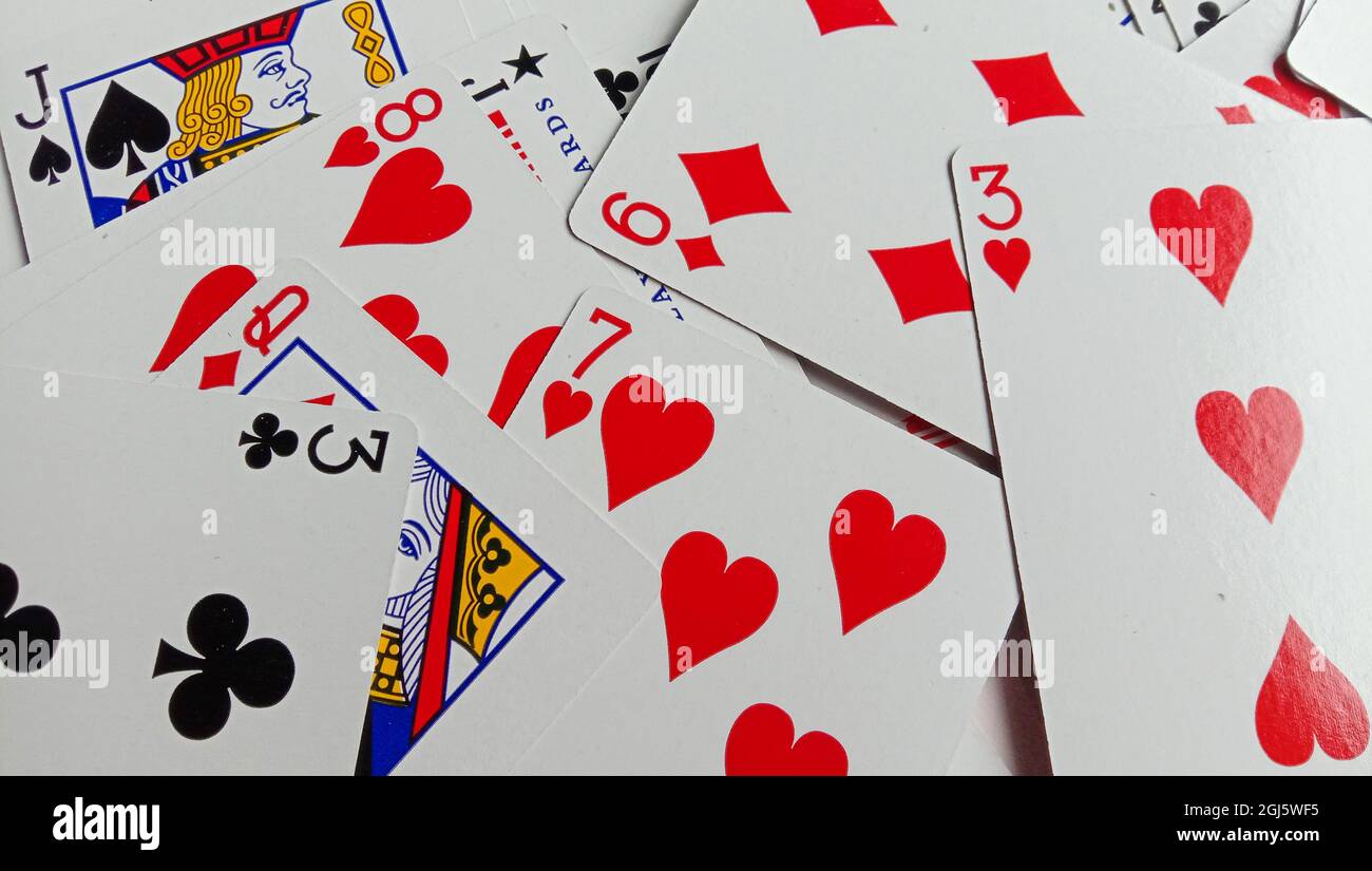 Scattered cards joker hi-res stock photography and images - Alamy
