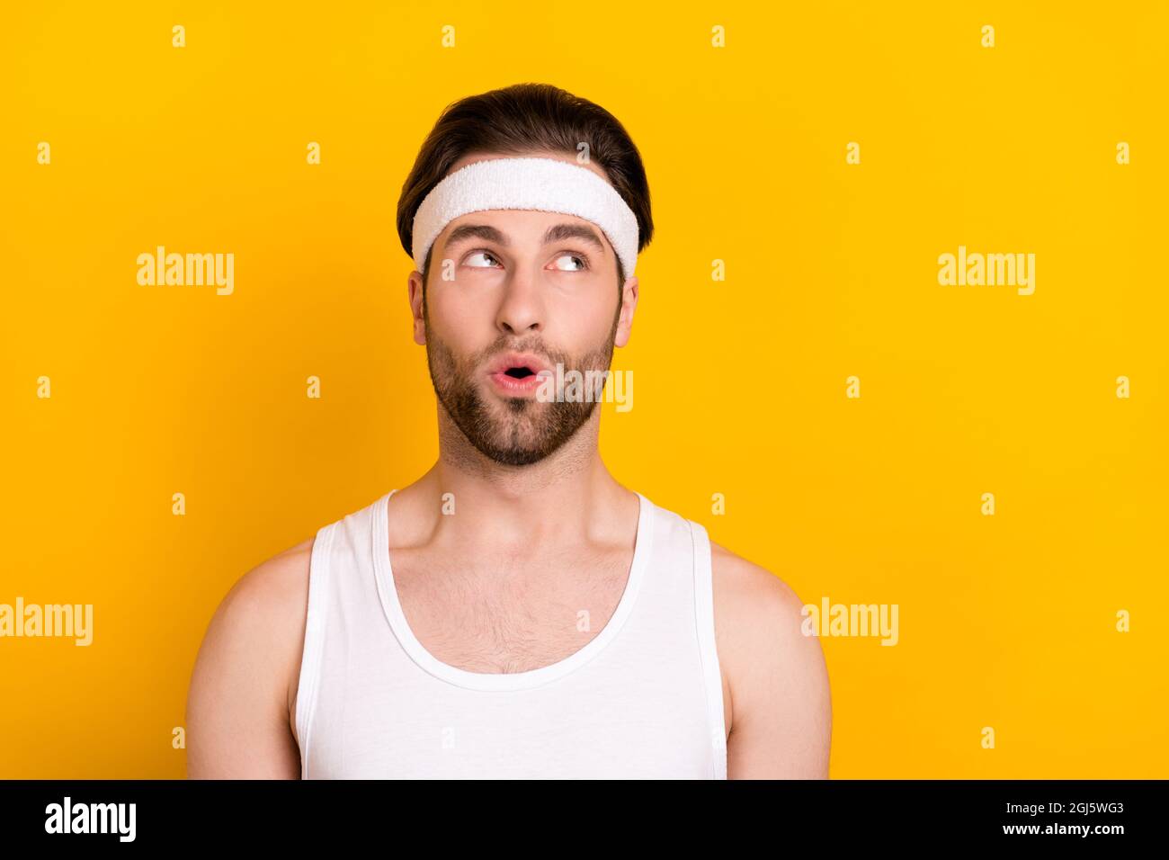 Portrait of attractive dreamy amazed guy sportsman pout lips thinking ...