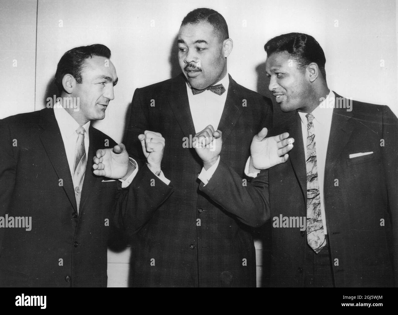 Middleweight Champion Carmen Basilio and Sugar Ray Robinson with Joe ...