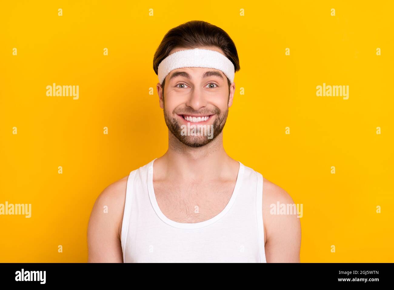 Portrait of attractive glad cheerful guy sportsman good mood isolated ...