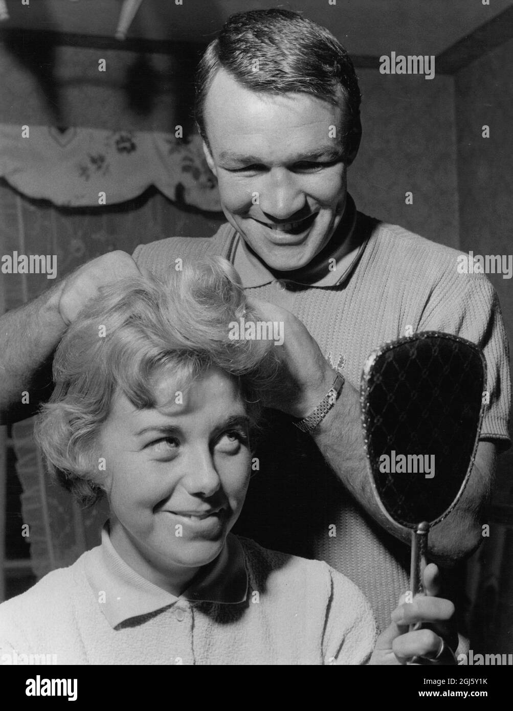 Dave Charnley , British lightweight boxing champion , working at his ...