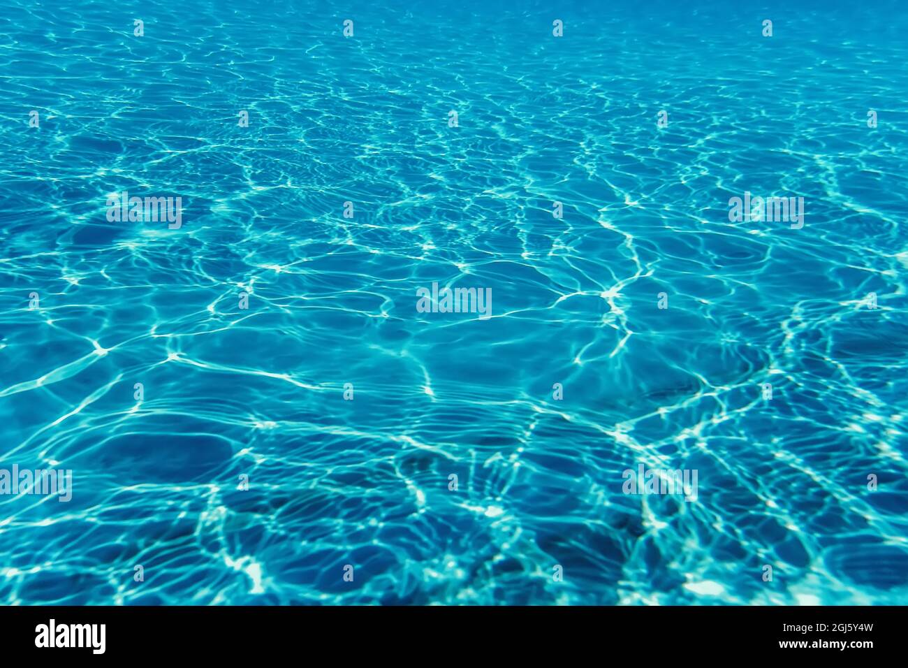 Swimming pool water sun reflection background. Ripple Water Stock Photo ...