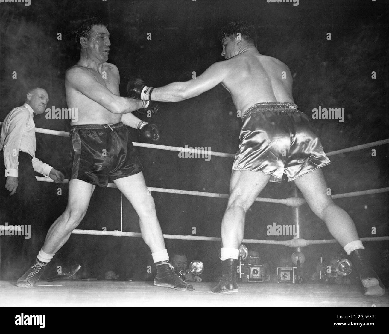Tommy vs Black and White Stock Photos & Images - Alamy