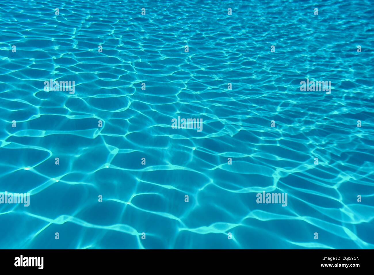 Swimming pool water sun reflection background. Ripple Water Stock Photo ...