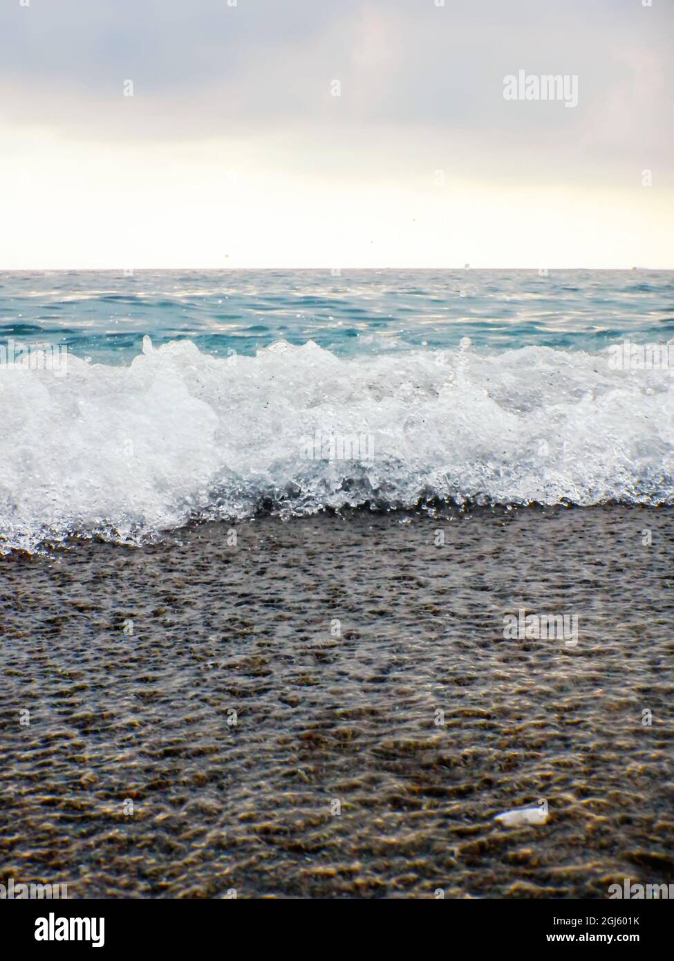 Breaking Wave of Blue Ocean on Pebbles beach Summer Background Stock ...