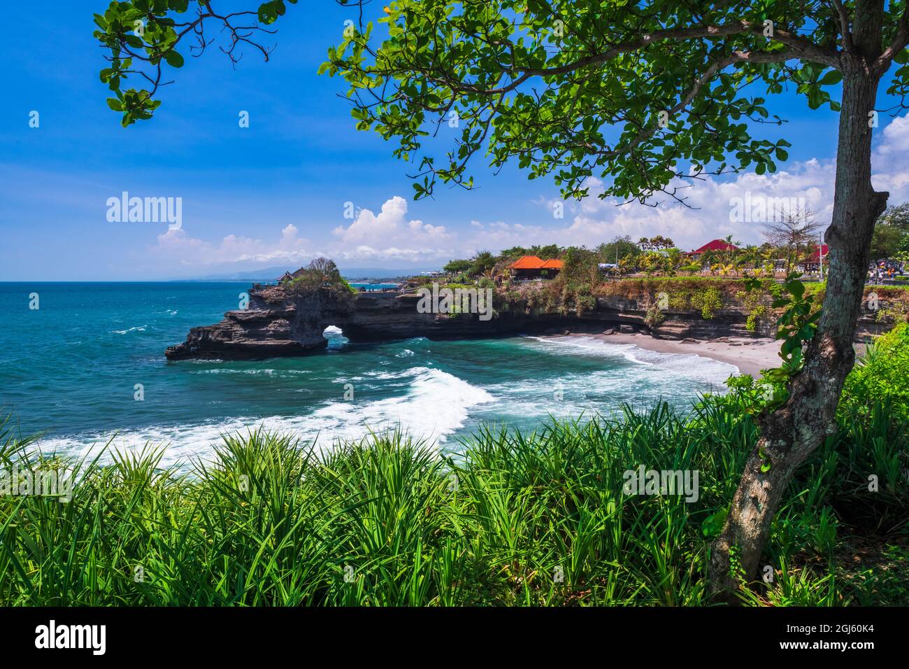 Sea arch at Tanah Lot Temple, Bali, Indonesia Stock Photo - Alamy