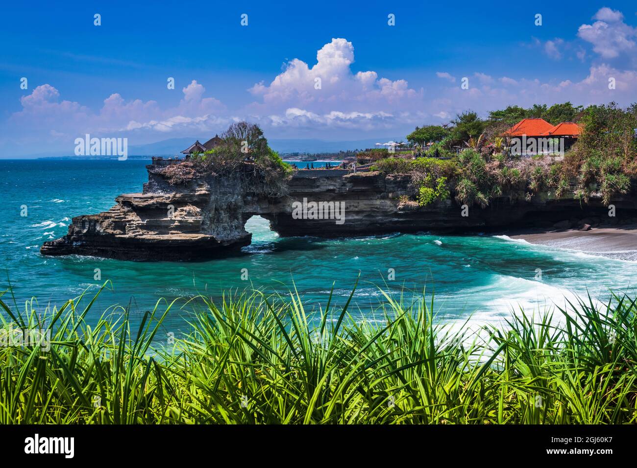 Sea arch at Tanah Lot Temple, Bali, Indonesia Stock Photo - Alamy