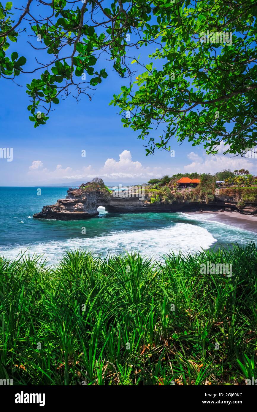 Sea arch at Tanah Lot Temple, Bali, Indonesia Stock Photo - Alamy