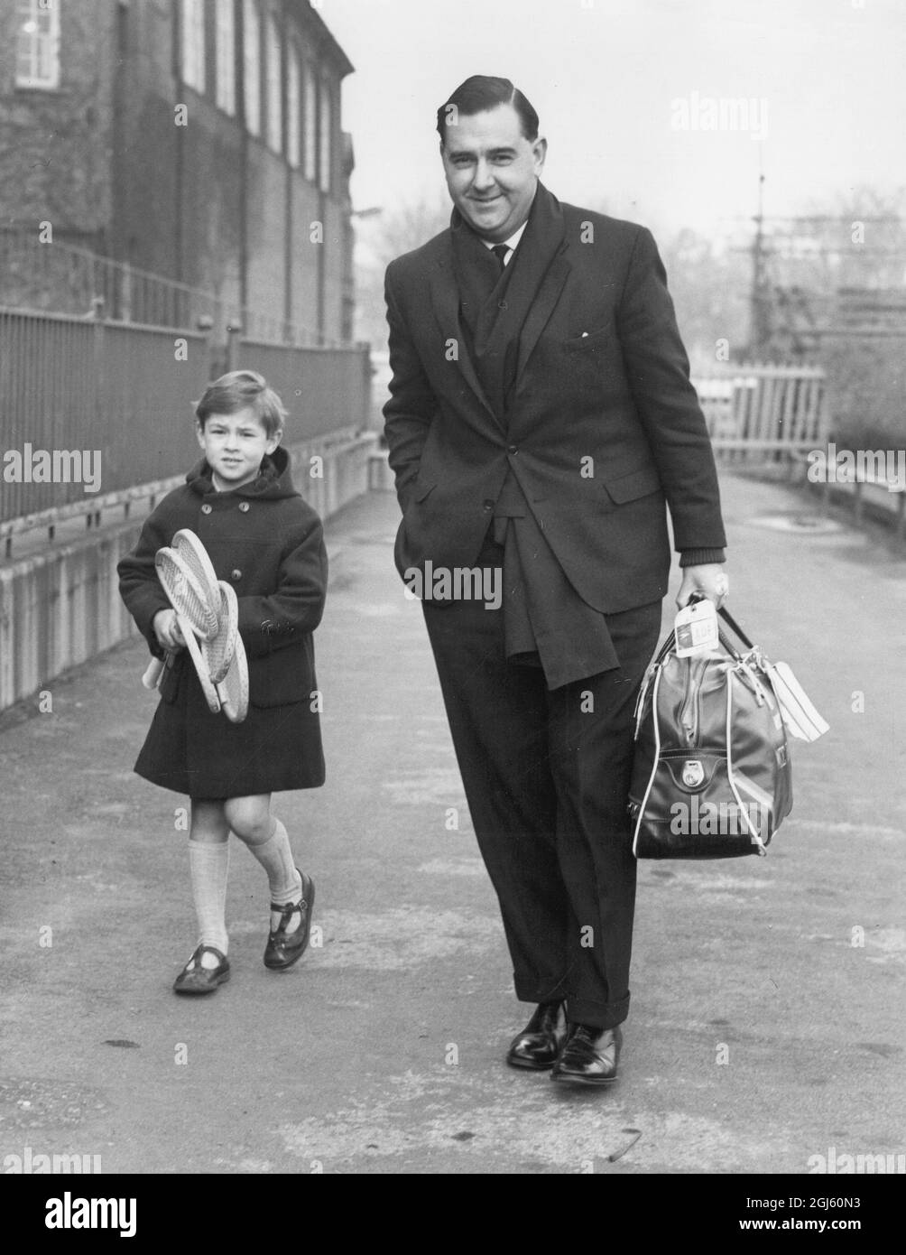 Colin Cowdrey with son Christopher arriving at Queen's Club London 18 ...