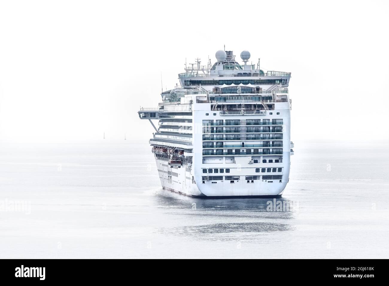 Luxury cruise liner anchored in the English Channel, UK. High key image ...