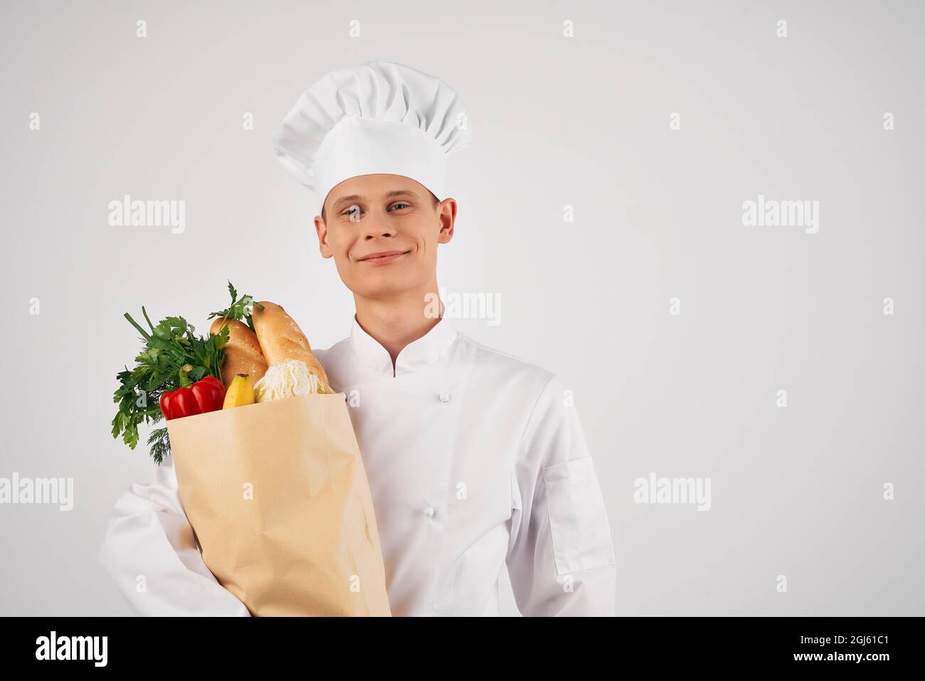 man in chef's clothes food package healthy food kitchen service Stock ...