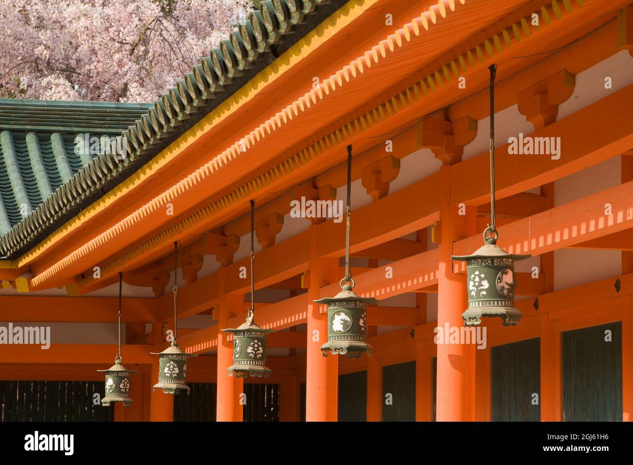 Japan, Honshu island, Kyoto, bronze lanterns and orange pillars of ...