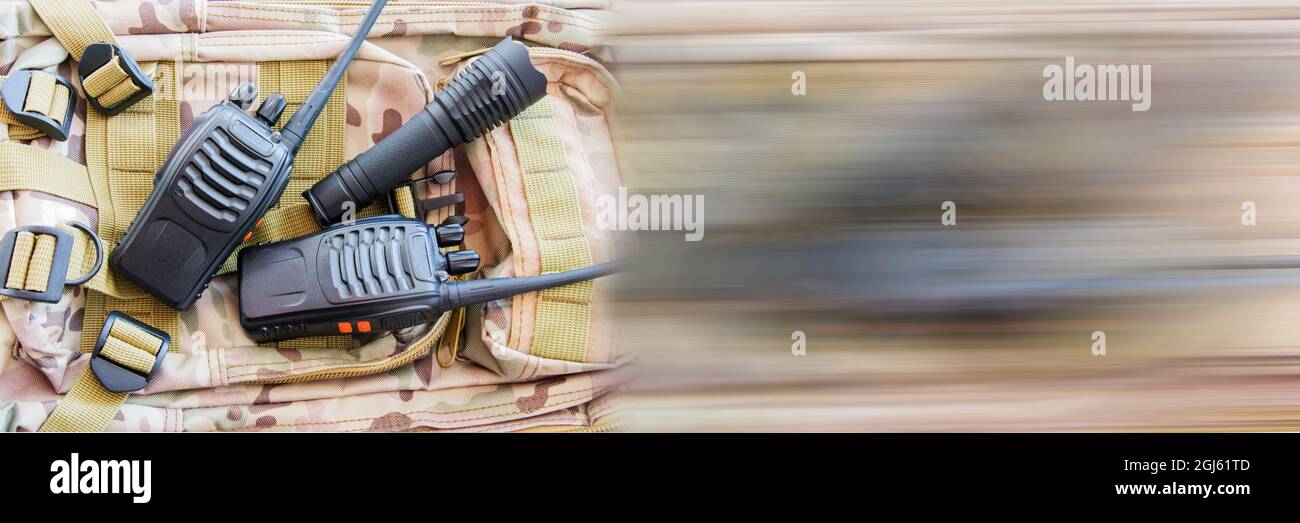 Portable radio set, army radio. Equipment for trekking. Set of traveler ...