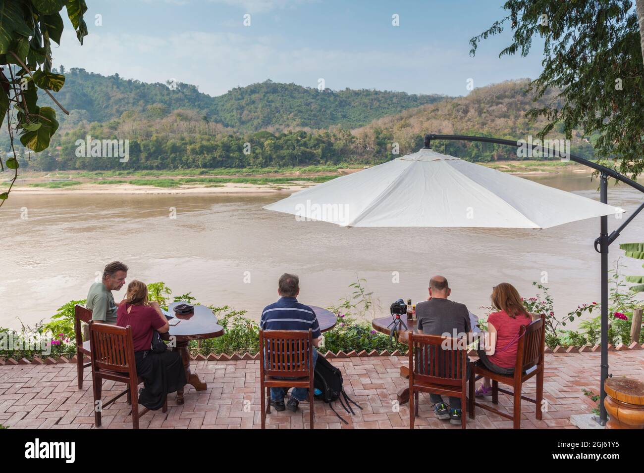 Laos, Luang Prabang. People at Mekong riverfront cafe Stock Photo - Alamy