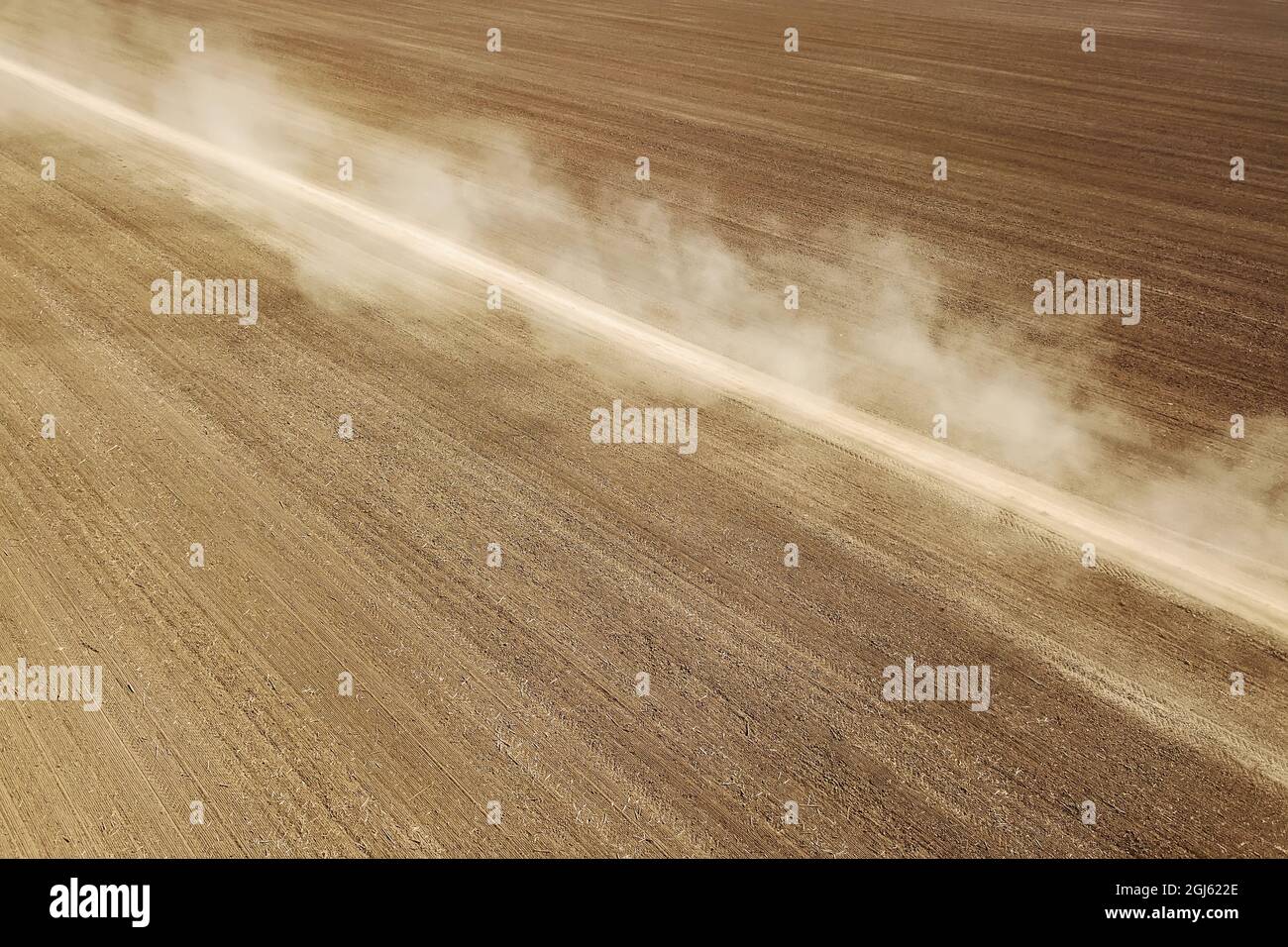 Aerial View Dirt road crossing Plowed Field Stock Photo - Alamy