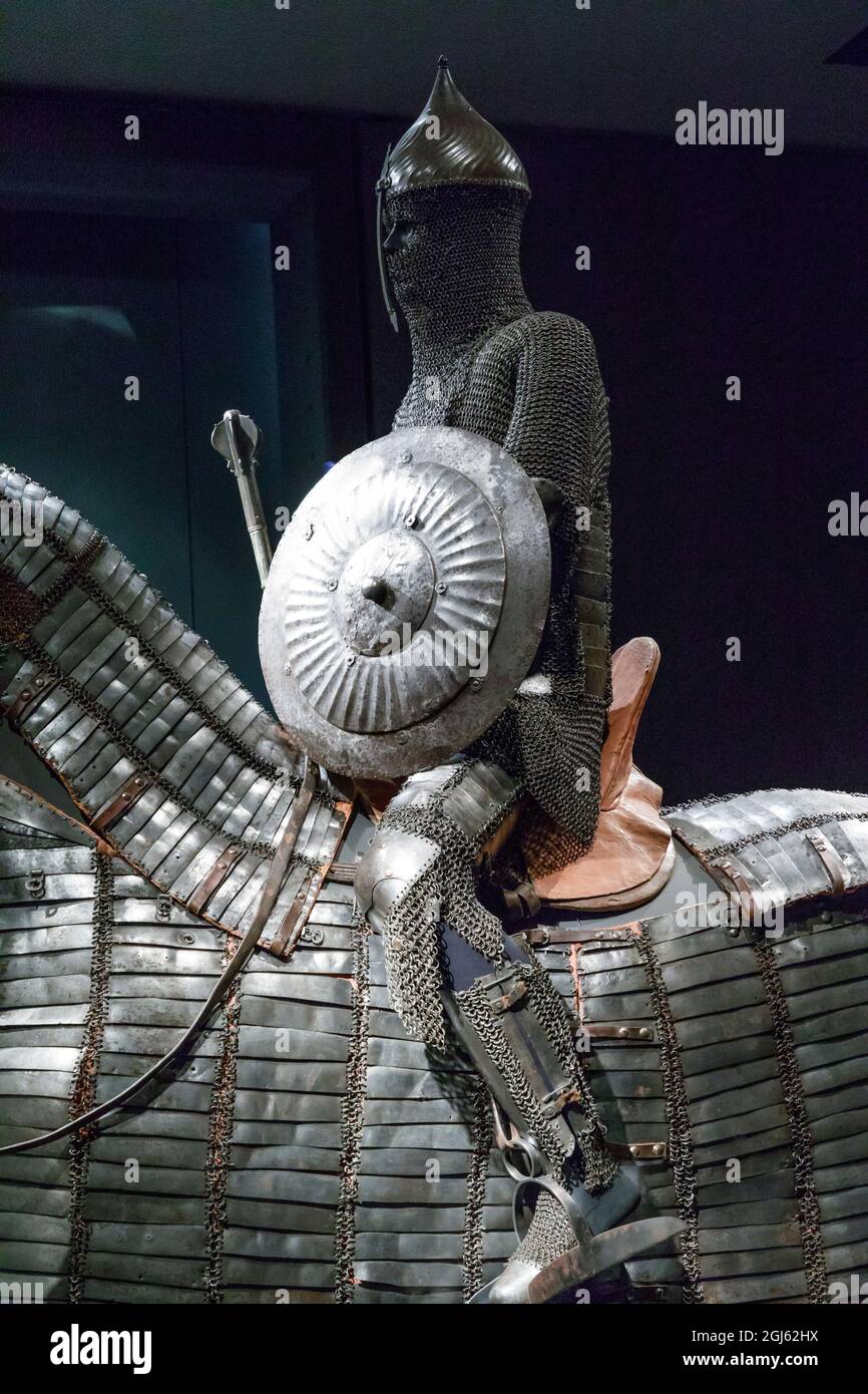 State of Qatar, Doha. Museum of Islamic Art. Exhibit of knight on horse ...