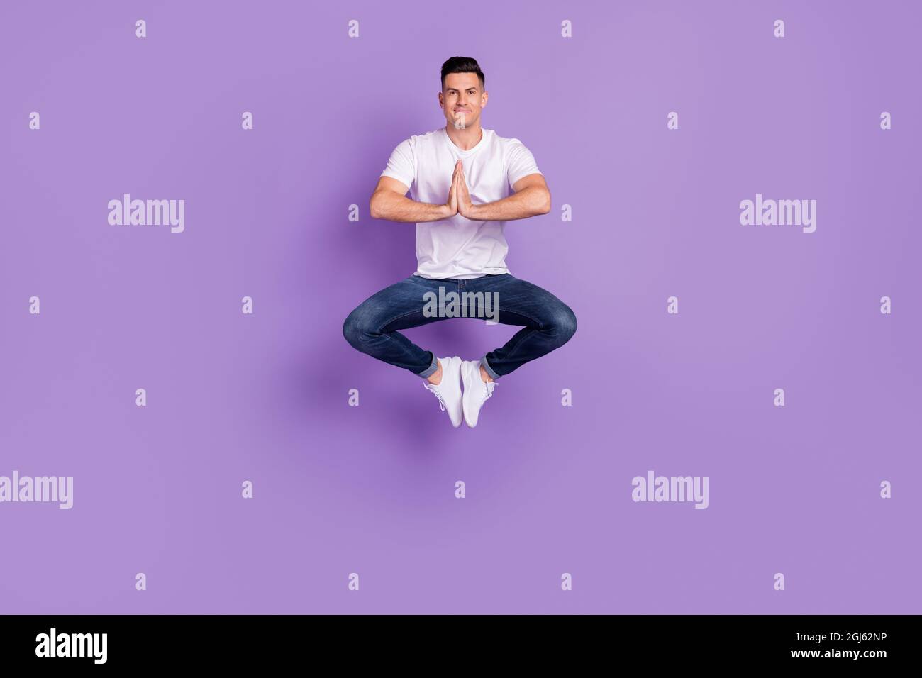 Full body photo of cheerful happy positive young man jump up clap hands ...