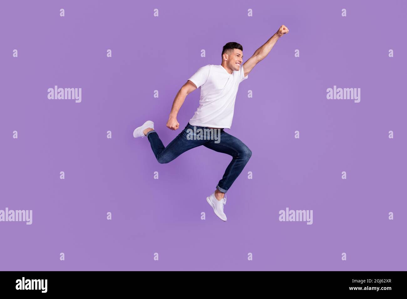 Full length profile side photo of young man happy positive smile jump ...