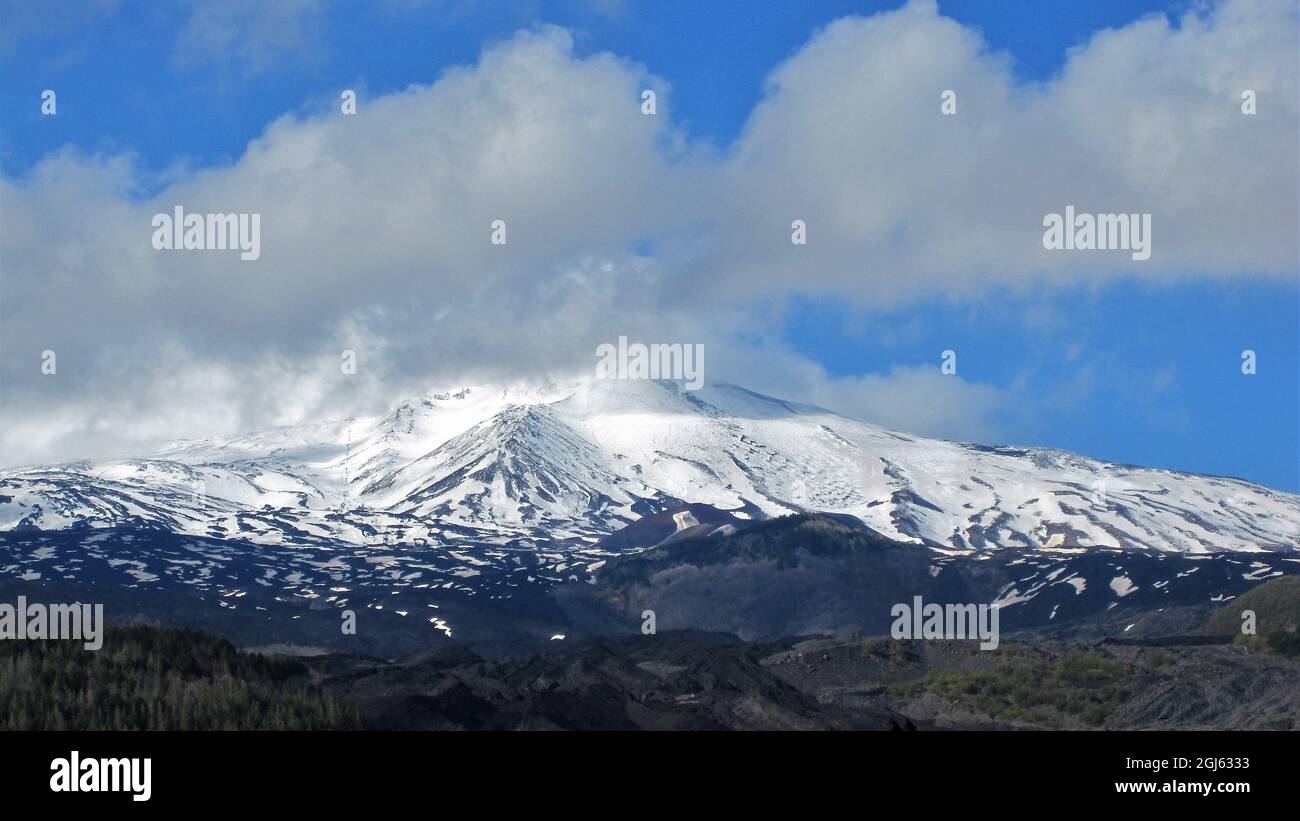 View of snow-capped Mount Etna volcano Stock Photo - Alamy