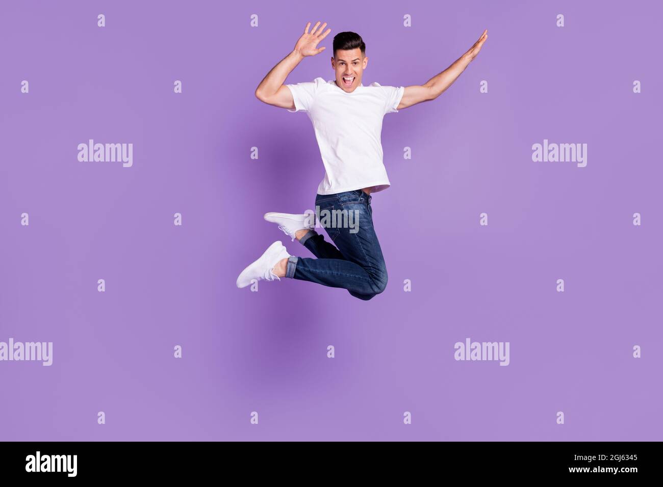 Full body photo of cheerful young happy man jump up air active good ...