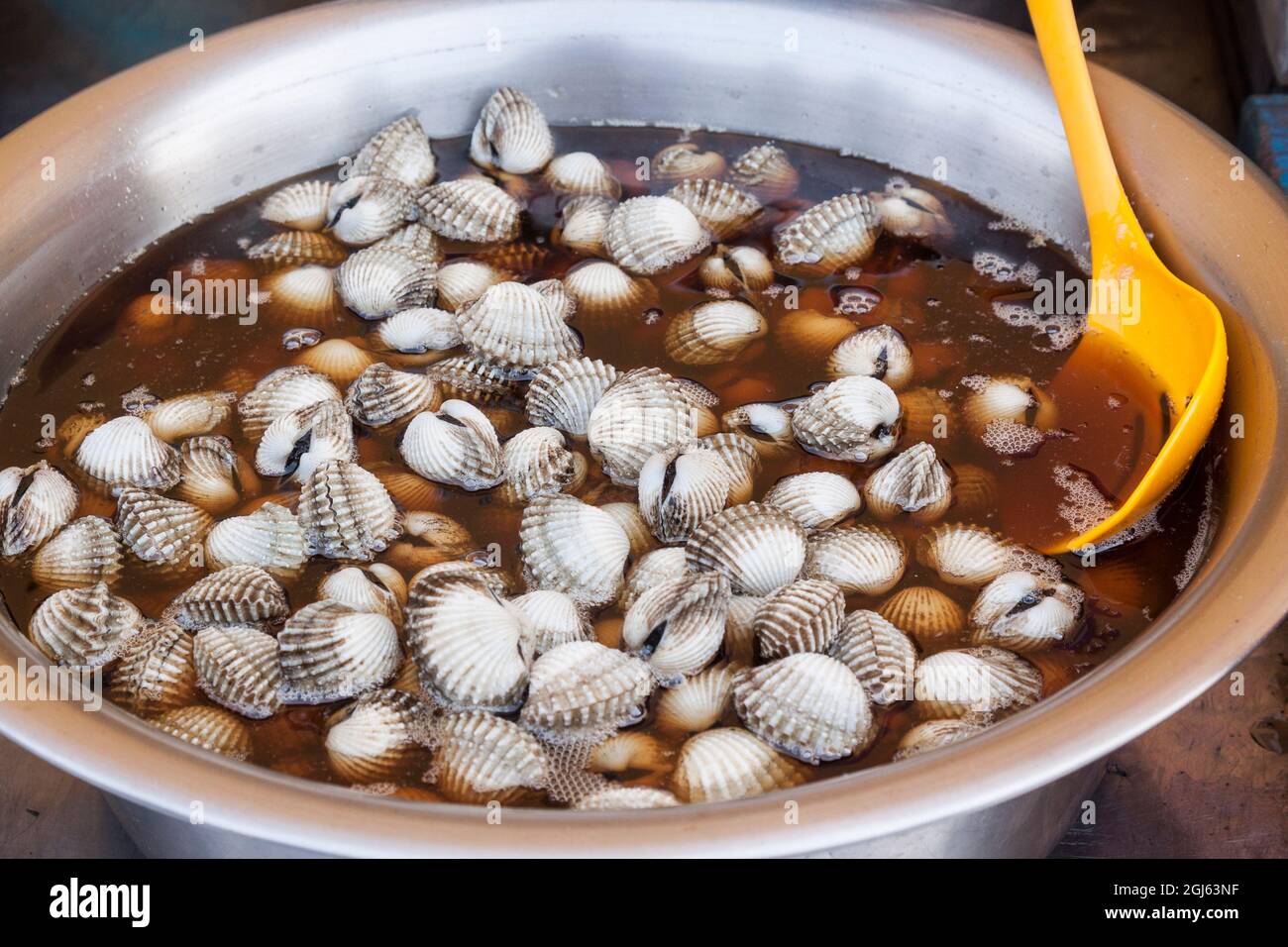 Thailand, Chonburi Province, Khao Sam Muk Shrine. Blood cockles cooked ...