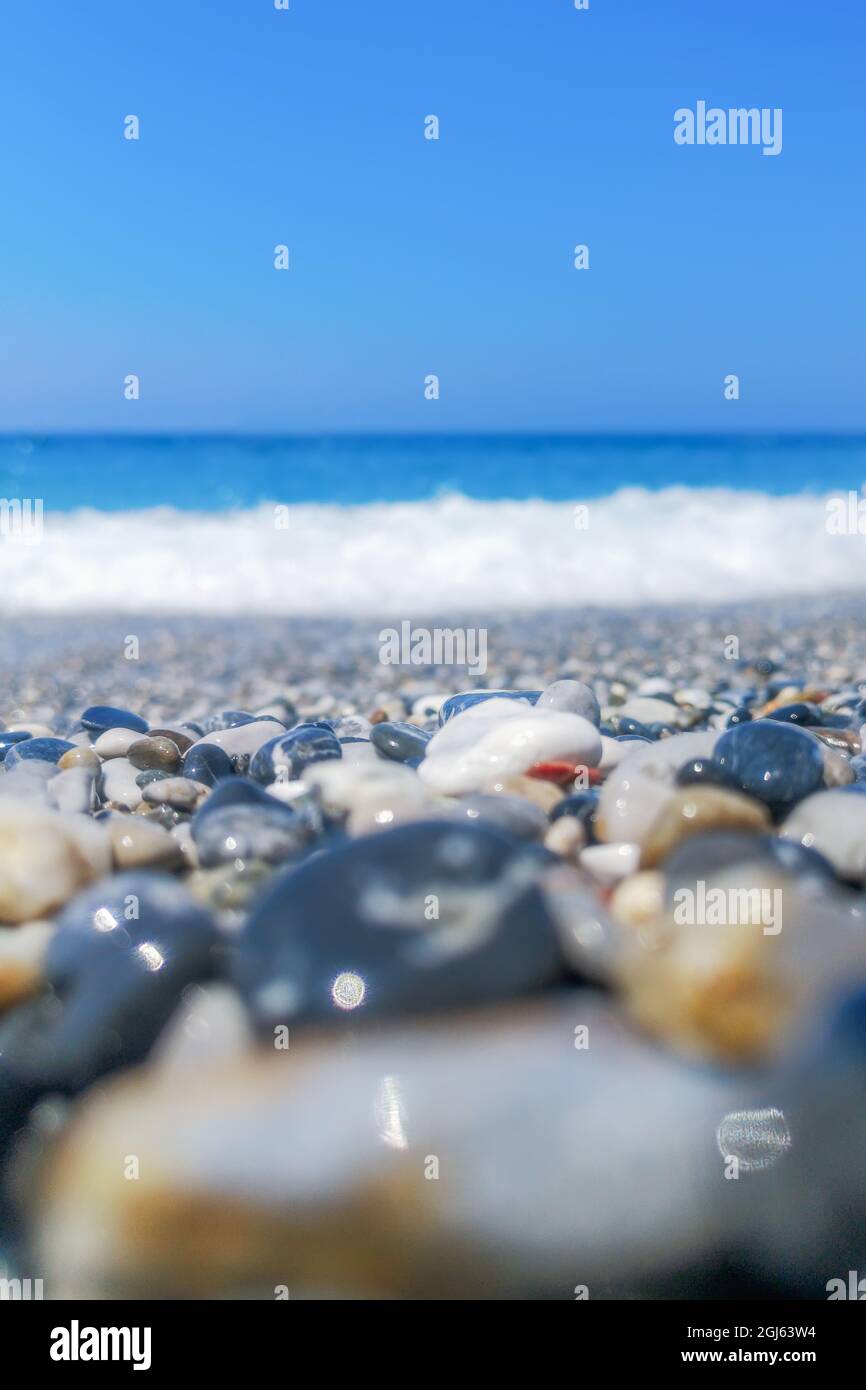 Breaking Wave of Blue Ocean on Pebbles beach Summer Background Stock ...