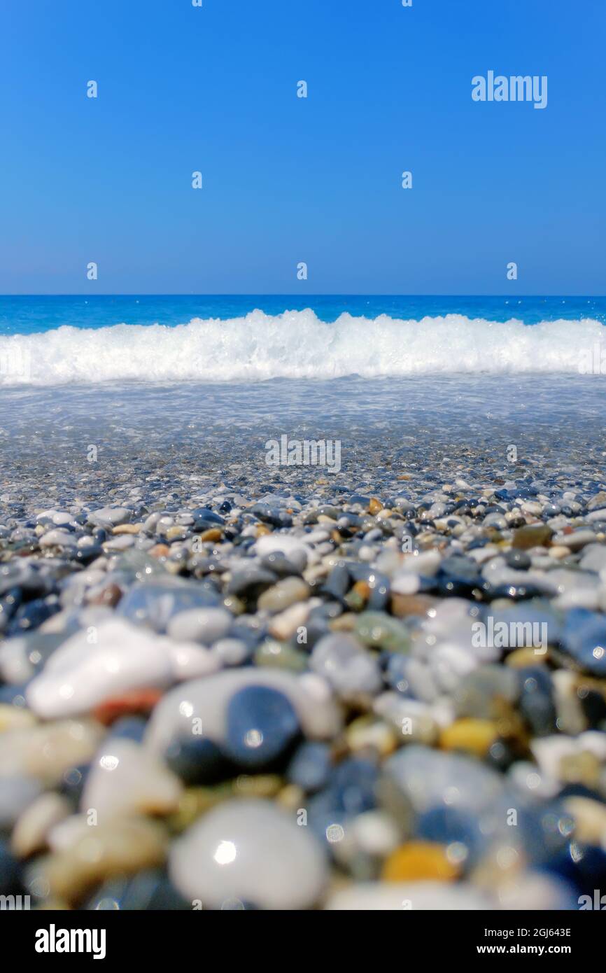 Breaking Wave of Blue Ocean on Pebbles beach Summer Background Stock ...