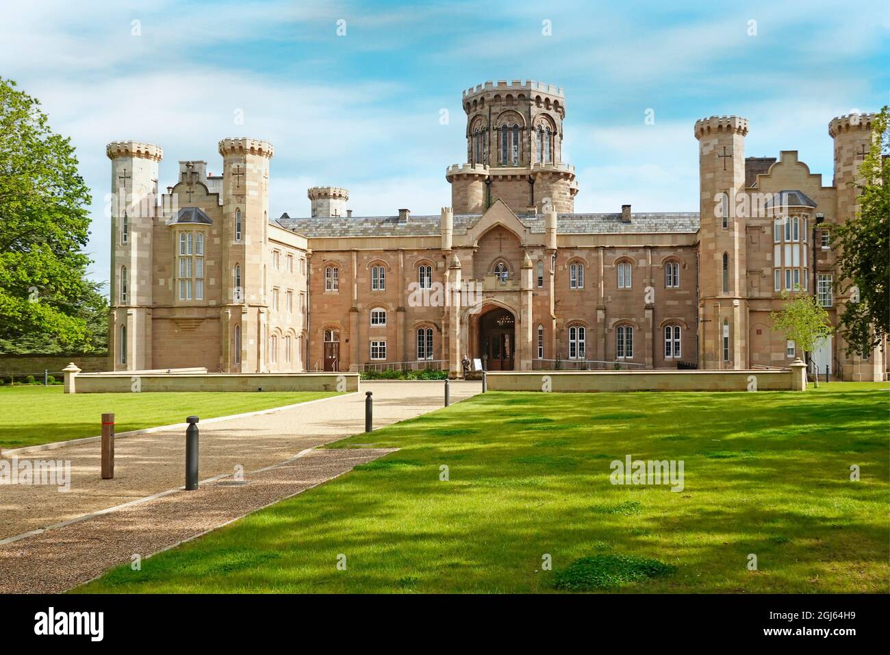 Entrance & stone façade of historical Studley Castle Grade II listed ...
