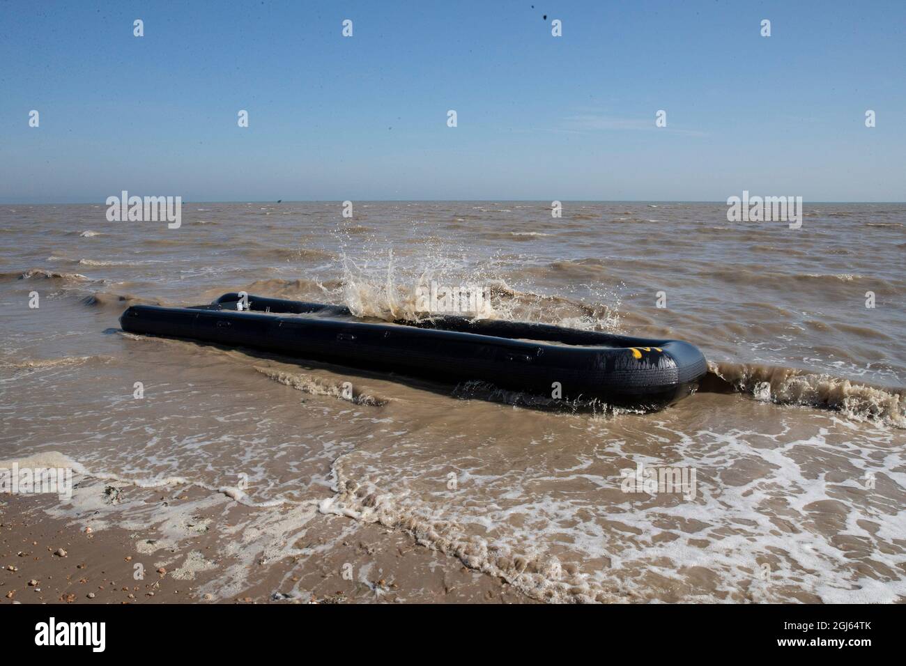 Police with migrants on beach hi-res stock photography and images - Alamy