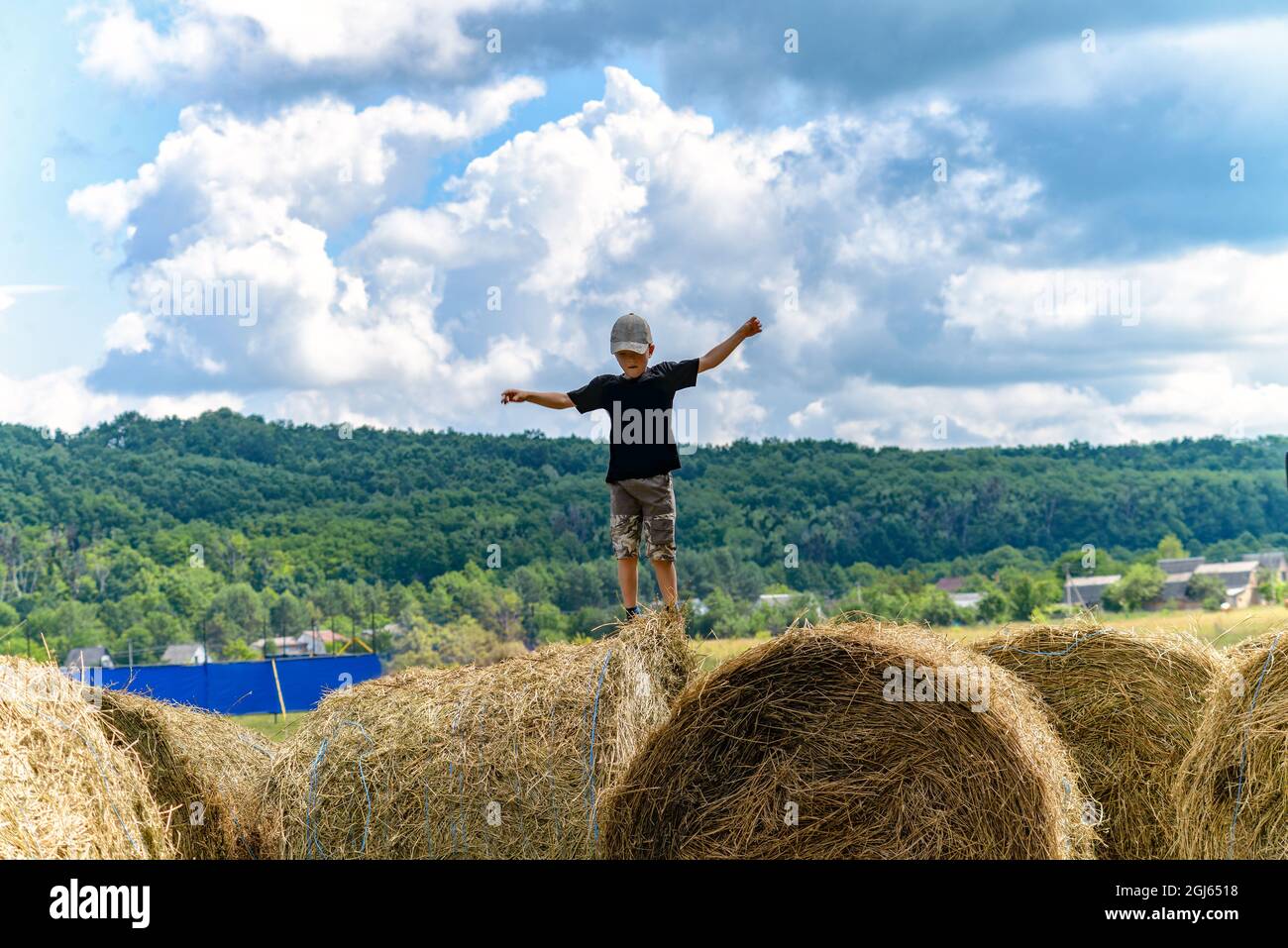 Haystack boy hi-res stock photography and images - Alamy