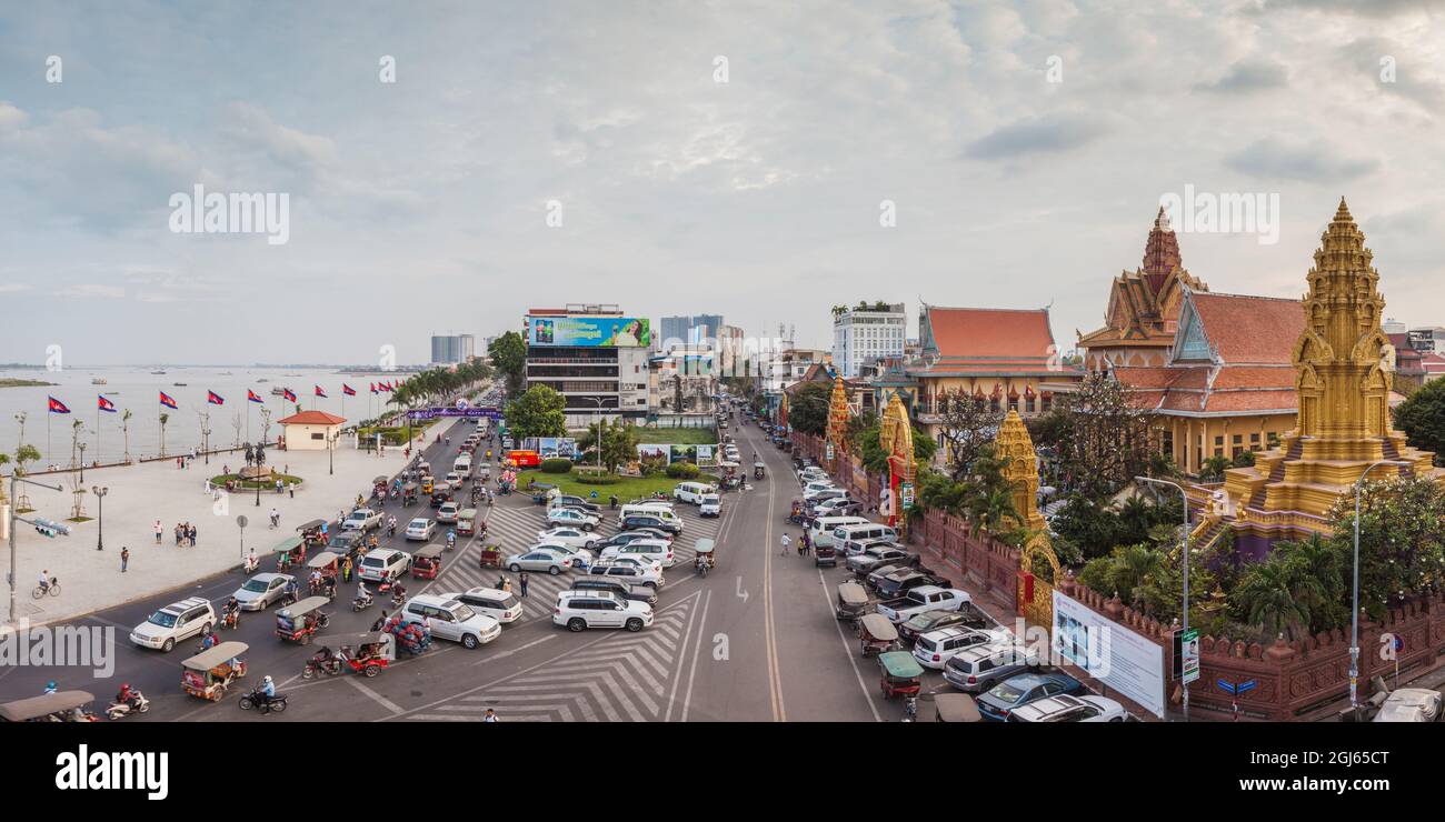 Cambodia, Phnom Penh. Sisowath Quay traffic, elevated view at dusk ...