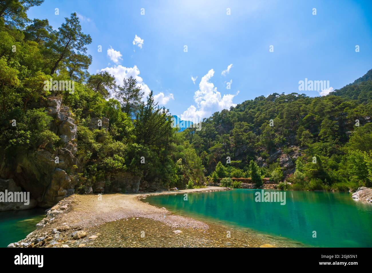 Emerald-colored lake in the forest in a canyon Stock Photo - Alamy