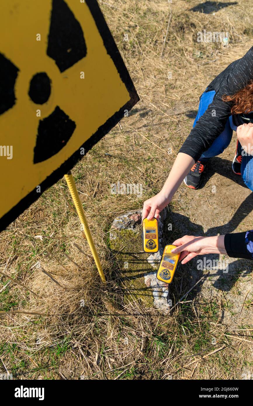 Ukraine, Pripyat, Chernobyl. Checking radiation monitors (dosimeters ...