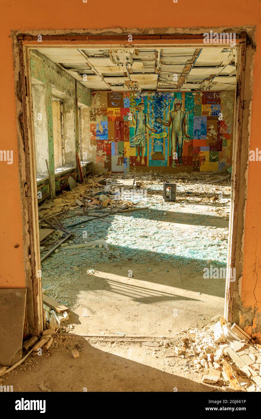 Ukraine, Pripyat, Chernobyl. Soviet-era mural in ruins of post office ...